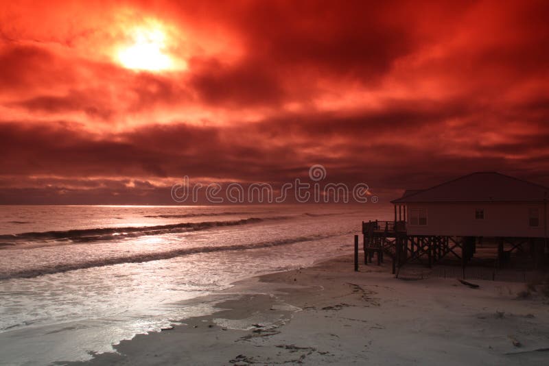 Photo of Beach and Ocean with Sun Using a Red Fliter. Stock Photo ...