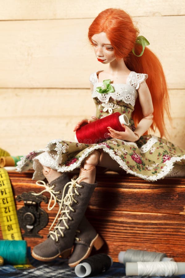 Doll and thread stock photo. Image of hinged, redhead - 112677912
