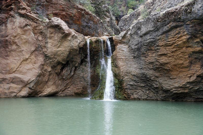 Green waterfall... stock image. Image of green, blurred - 2932043