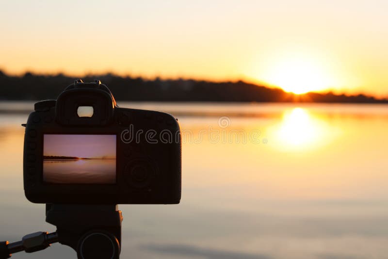 Photo of Beautiful Riverside Sunset on Display of Professional Camera ...