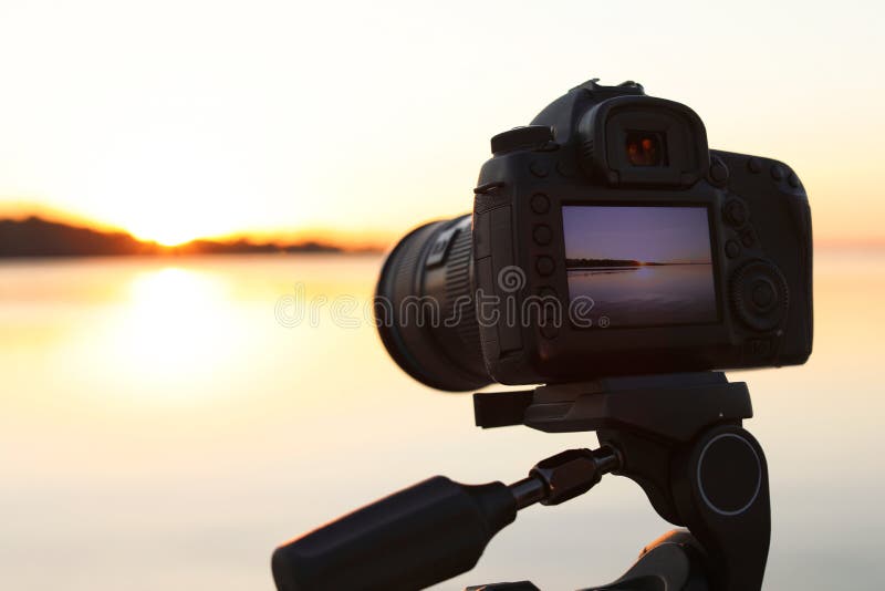 Photo of Beautiful Riverside Sunset on Display of Professional Camera ...