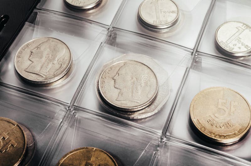 Photo of a Belgian Coins in a Clear Plastic Sheet Holder Stock Photo ...