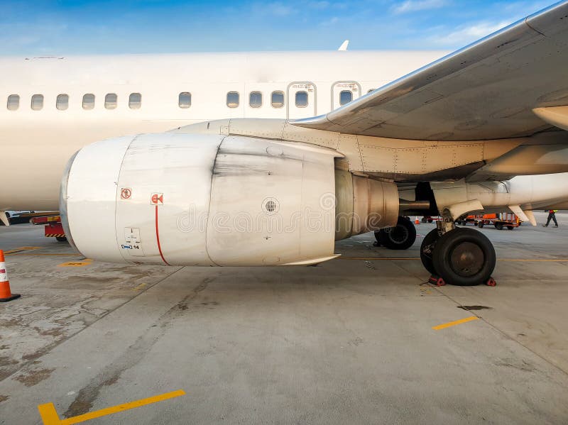 Photo of Big Airplane Jet Engine Parked in Airport Stock Photo - Image ...