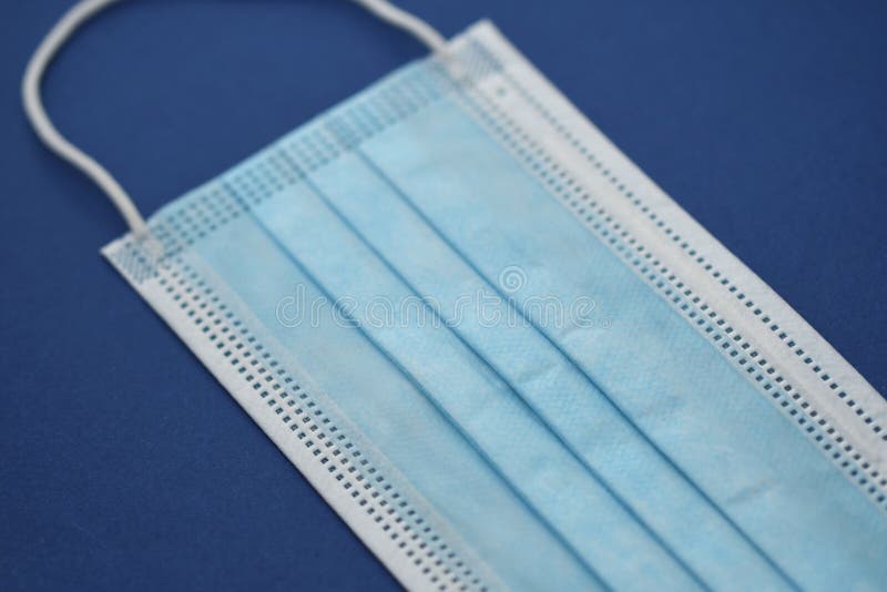 Photo of a blue face mask stock photo. Image of care - 221194230