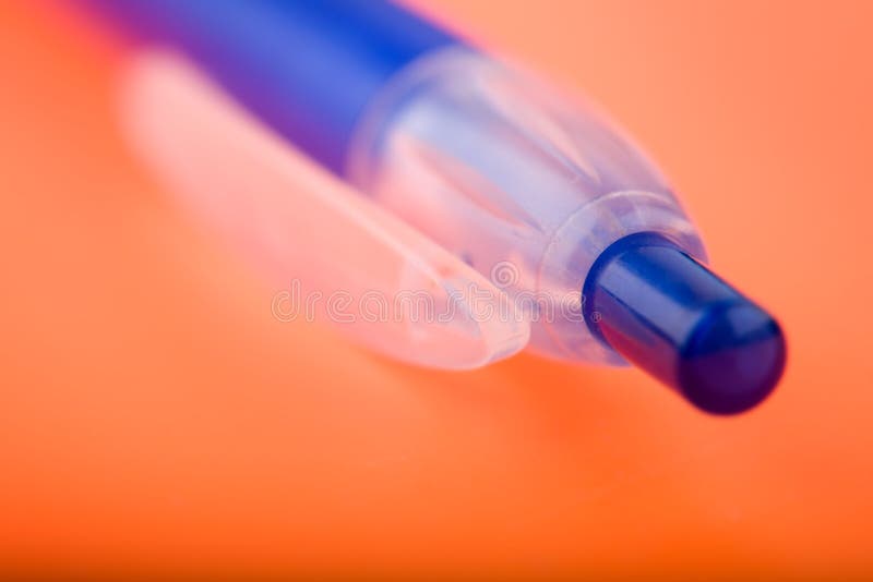Photo of a Blue Pen on Orange Notebook Stock Image - Image of copyspace ...