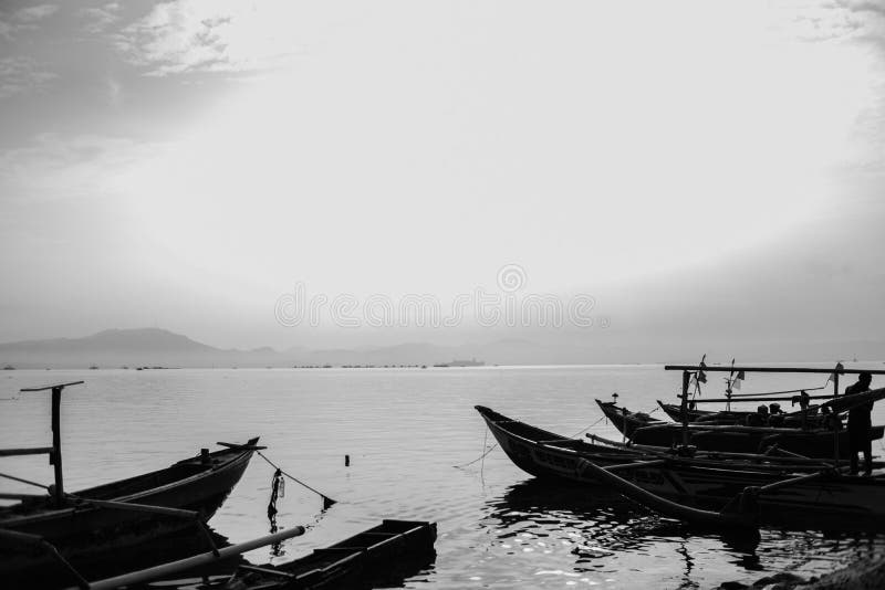 Photo of the Boat Leaning on the Edge of the Pier Stock Photo - Image ...