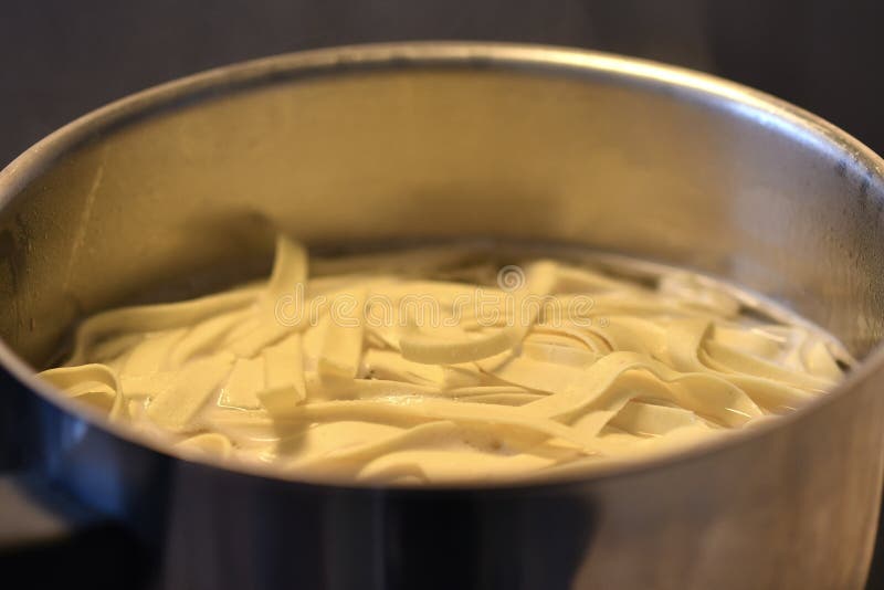 Photo of Boiling Noodles or Pasta Stock Image - Image of food, family ...