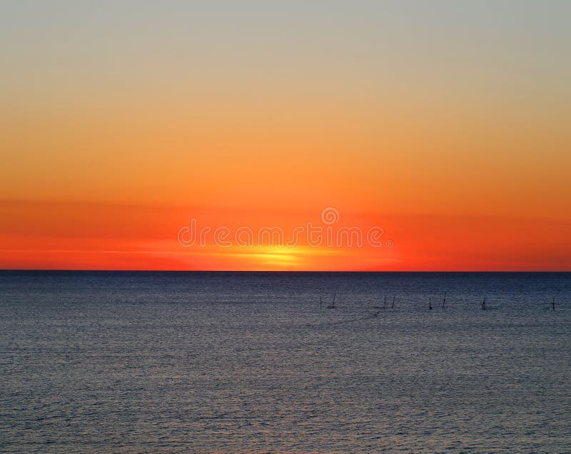 Photo of a Bright Sea Sunset Stock Photo - Image of gold, scene: 95026102