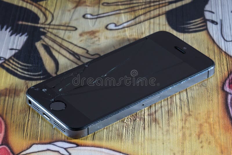 Photo of a broken iPhone 5 editorial stock image. Image of macro - 45614894