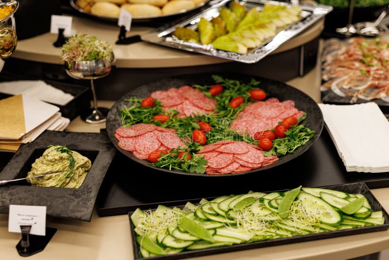 A Photo of a Buffet Table with Various Dishes and Platters of Food ...