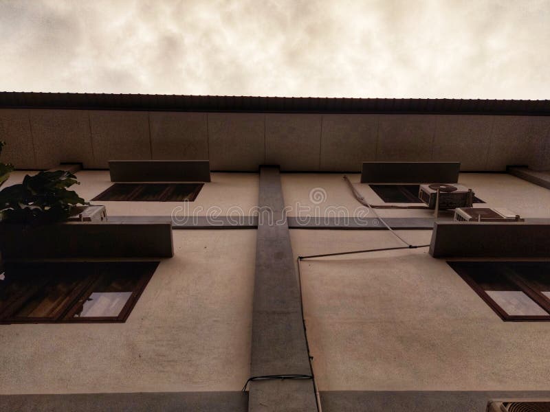 Photo of a Building with a Cloudy Atmosphere Stock Image - Image of ...