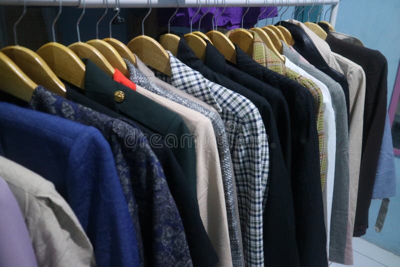 Photo of a Bunch of Clothes Hanging Stock Photo - Image of clothes ...