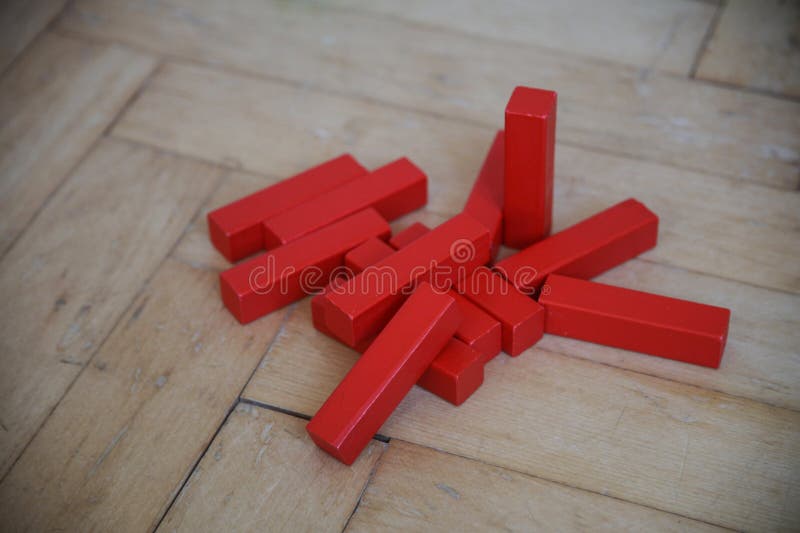 Bunch of Red Rectangular Wooden Blocks on a Wooden Floor Stock Photo ...