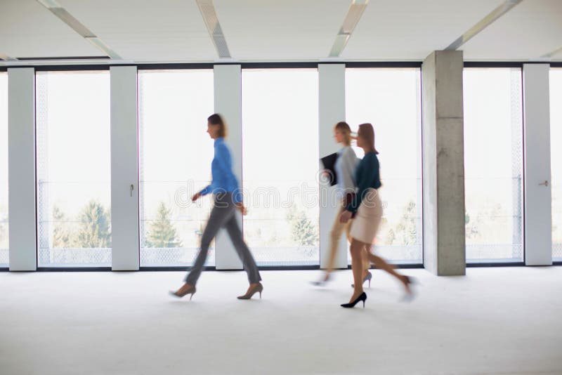 Business People Walking in Office Hall Stock Photo - Image of angle ...
