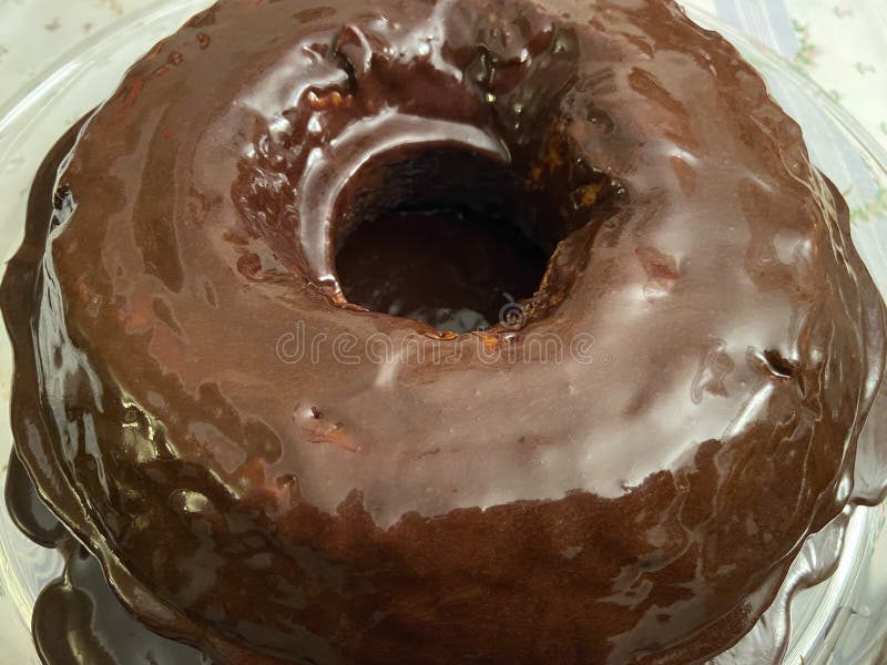 Cake with a Ton of Chocolate Icing Stock Photo - Image of round ...
