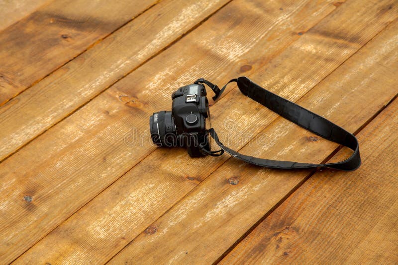 Photo camera on the floor stock photo. Image of brown - 75929364