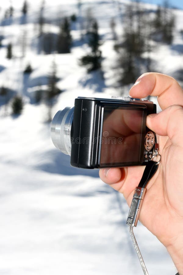 Photo camera in hand stock photo. Image of digital, camera - 4364992