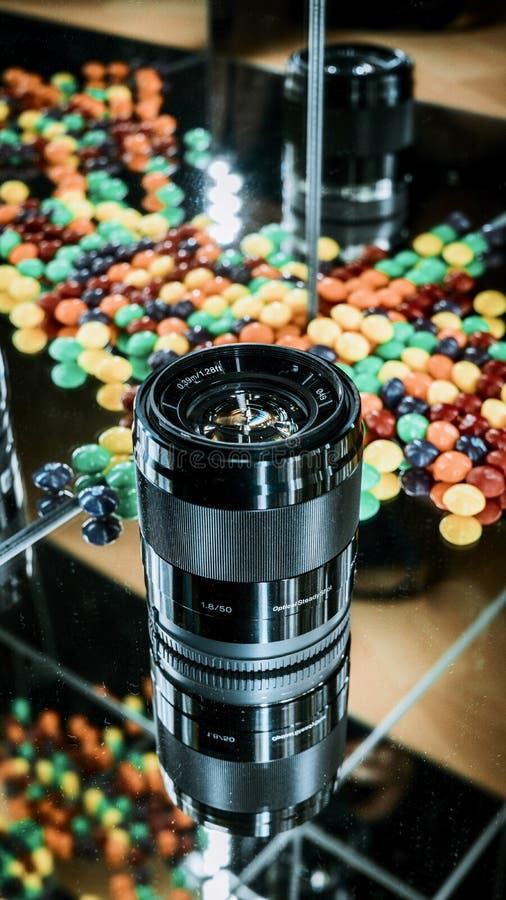 Photo Camera Lens in the Mirror Cube Stock Image - Image of cube ...