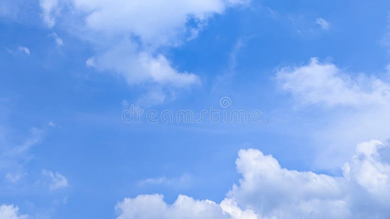 This Photo Captures a Bright and Serene Sky Filled with Scattered ...