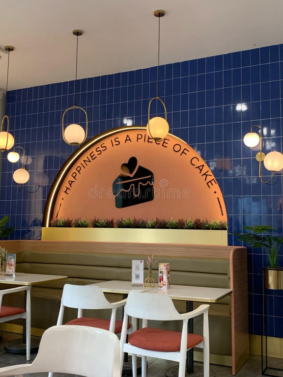 This Photo Captures the Interior of a Modern Cafe or Bakery that is ...