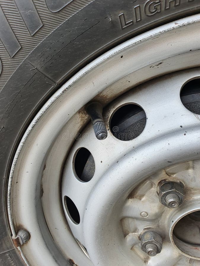 Photo of a Car Tire Valve and Wheels Stock Photo - Image of wheels ...