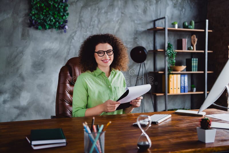 Photo of Charming Successful Woman Boss Sitting Reading Plan Tasks ...