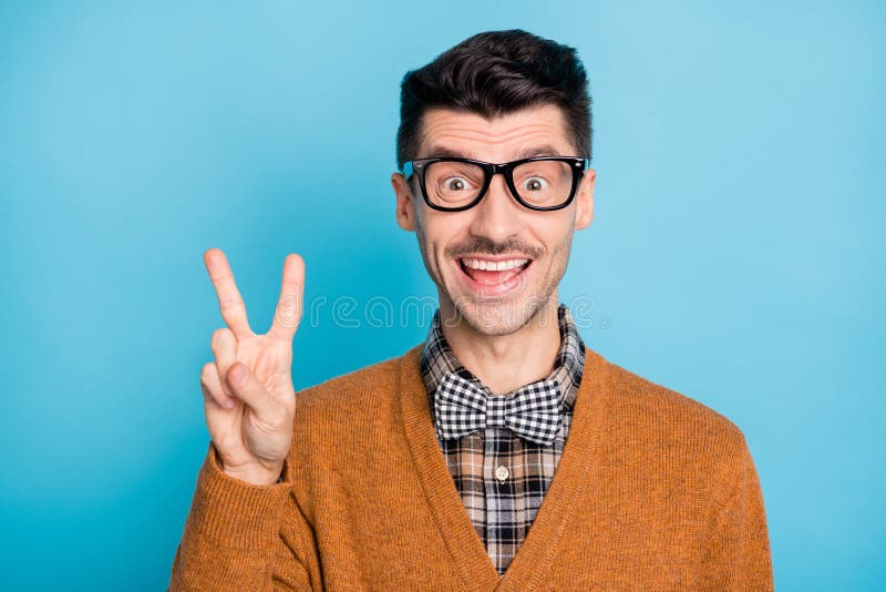 Photo Of Cheerful Handsome Young Man Hold V Sign Good Mood Nerd Geek
