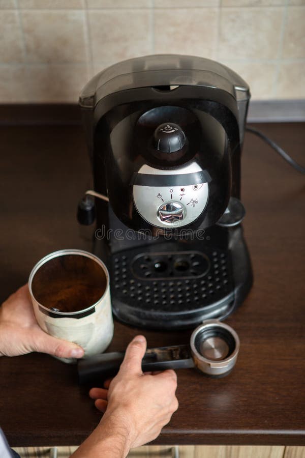 Photo of Coffee Maker, Man`s Hands Holding Coffee Mug Stock Image ...