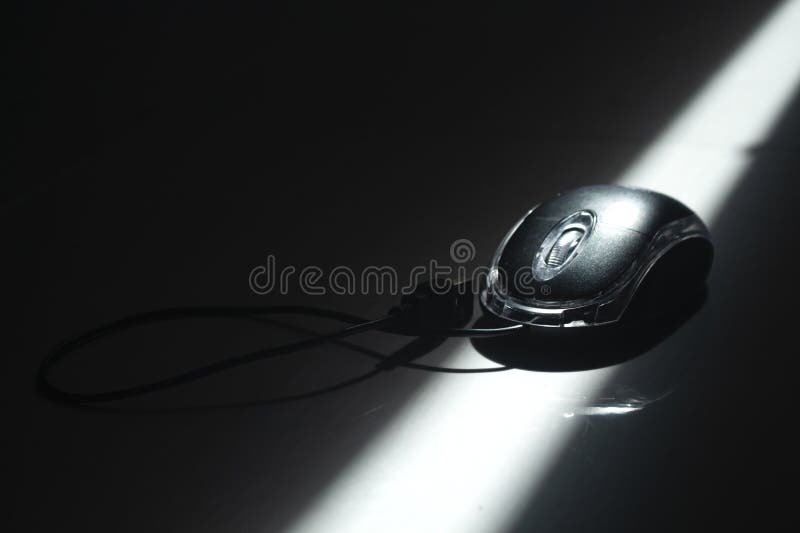A Computer Mouse and Cable Glow in the Dark Stock Image - Image of ...