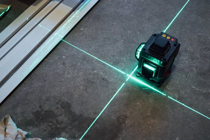 A Photo of a Construction Site with a Laser Level Projecting Clear ...