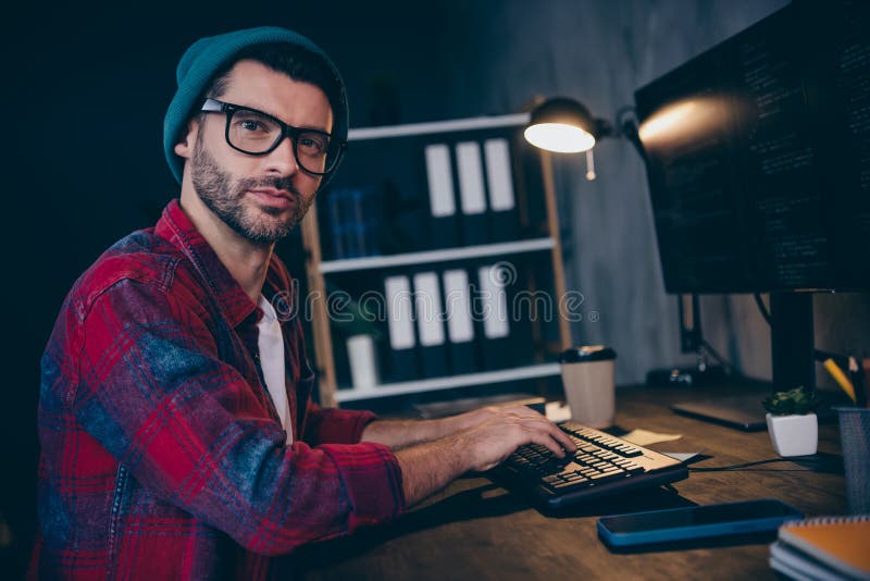 Photo of Cool Serious Coder Dressed Hat Glasses Fulfilling Task Modern ...