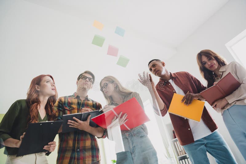 Photo of Corporate Colleagues Concentrated on Searching Problem Inside ...