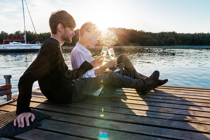 Couple in Love Drinking Champagne on the Dock Stock Photo - Image of ...
