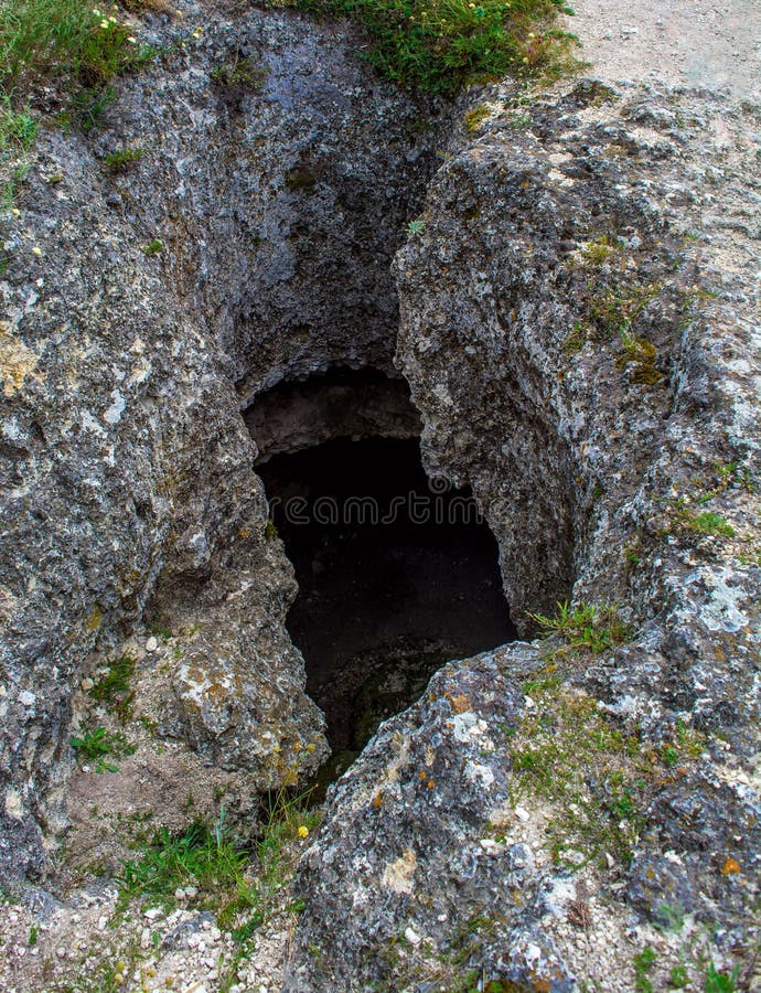 Photo of Dark Cave Hole in the Rock Stock Photo - Image of earth ...