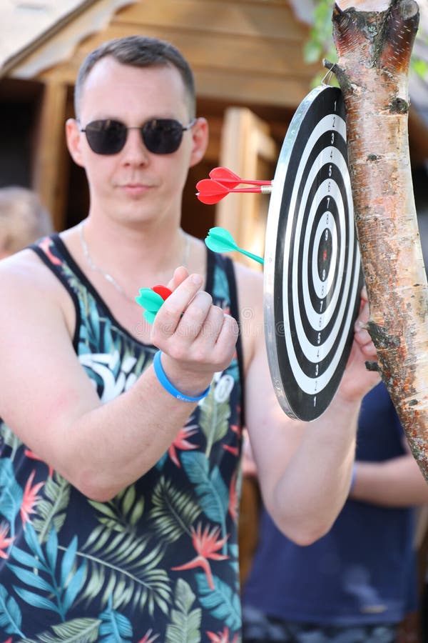 Photo of a Dart Board Hanging from a Tree Editorial Photo - Image of ...