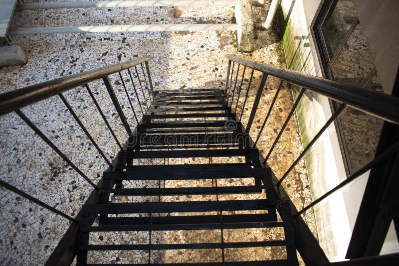 Photo of Designer Black Stairs Going Downwards with Railing Stock Photo ...