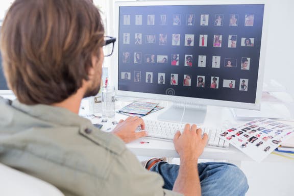 Photo Editor Viewing Thumbnails on Computer Stock Image - Image of cool ...