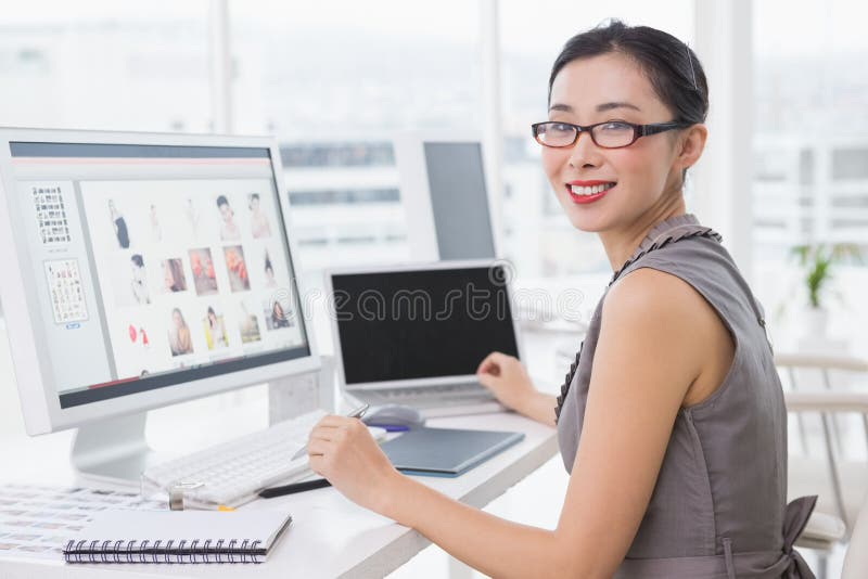 Photo Editor Working at Her Desk Stock Photo - Image of technology ...