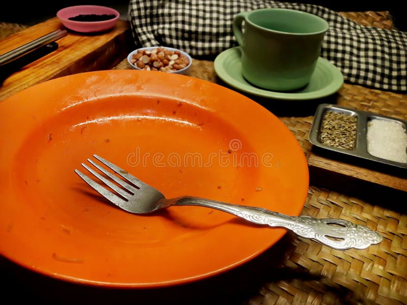 Photo of Empty Plates of Food on the Table after Dinner Stock Photo ...