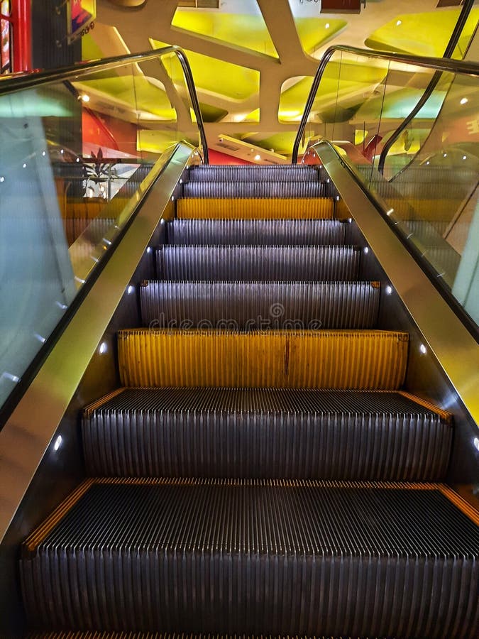 Photo of escalator in mall stock image. Image of machine - 269096741