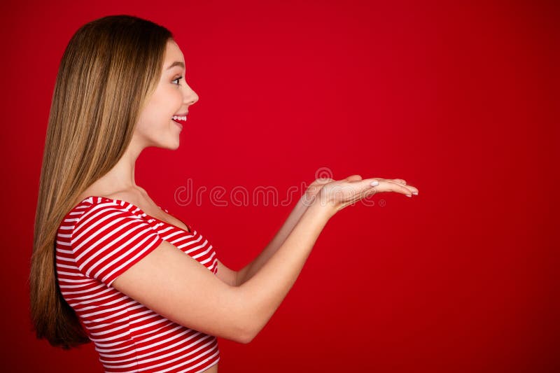 Photo Of Excited Funky Girl Wear Striped Top Showing Arms Empty Space