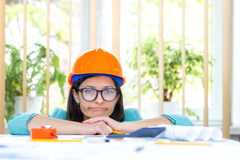 Photo of Female Engineer Wearing Orange Helmet. Stock Image - Image of ...
