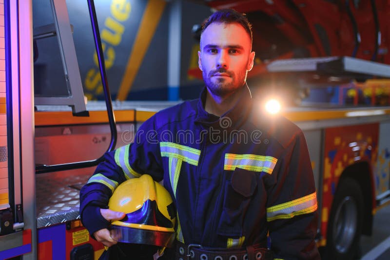 Photo of Fireman with Gas Mask and Helmet Near Fire Engine Stock Image ...