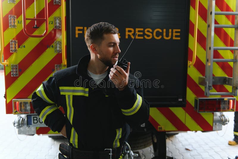 Photo of Fireman with Gas Mask and Helmet Near Fire Engine Stock Image ...