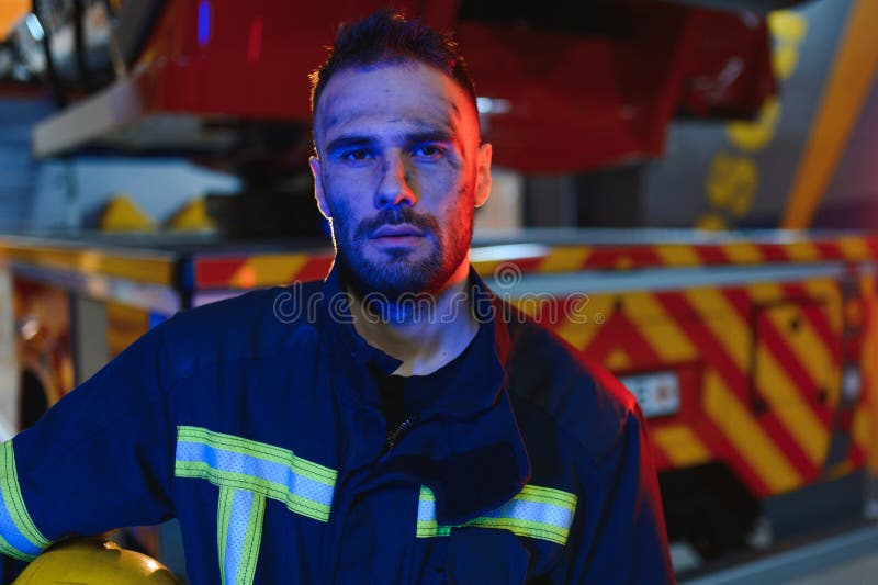 Photo of Fireman with Gas Mask and Helmet Near Fire Engine Stock Photo ...
