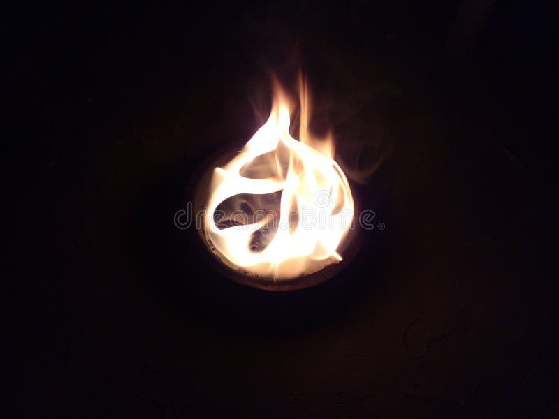 Photo of Flame from Burning Plastic Waste in a Small Aluminum Bowl ...