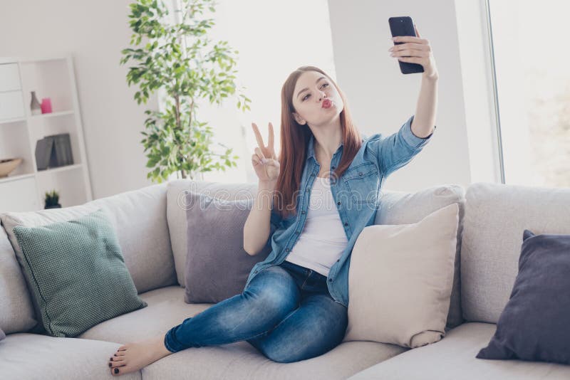 Photo Of Flirty Lady Telephone In Hands Making Selfies Showing V Sign