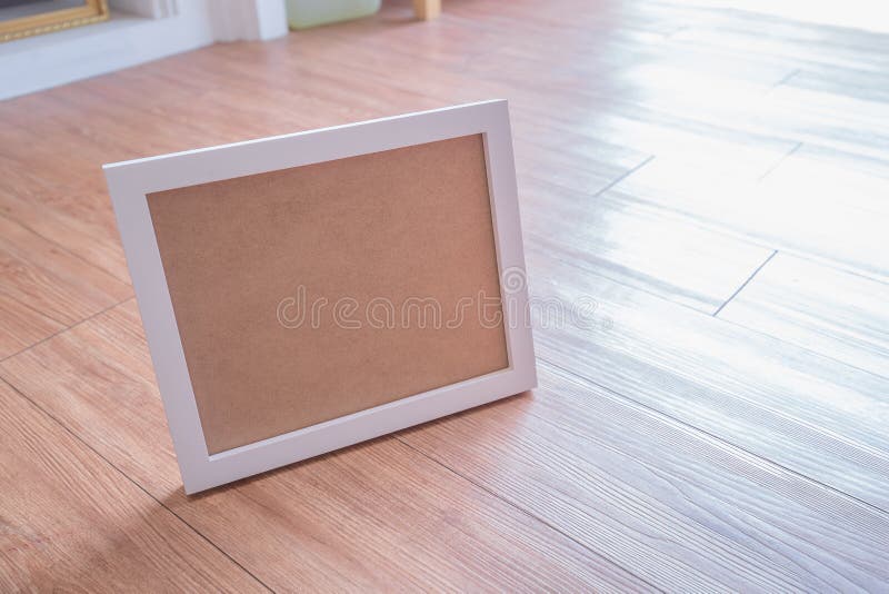 Photo frame on floor stock photo. Image of space, blank - 114433260