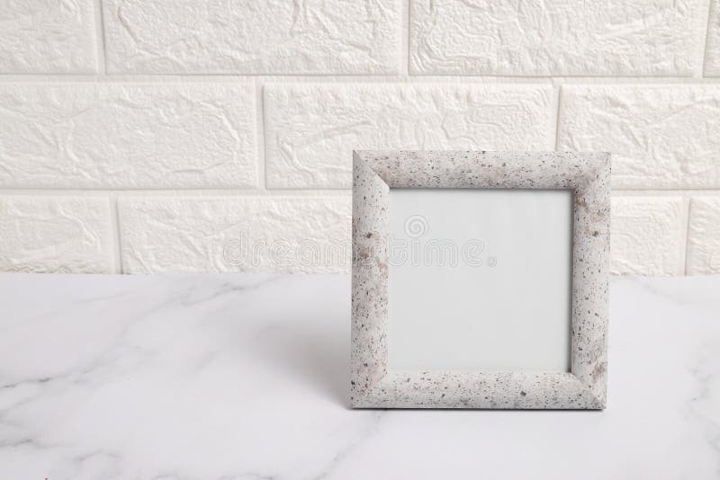 Photo Frame on Table Mockup Stock Photo - Image of white, wall: 261511418