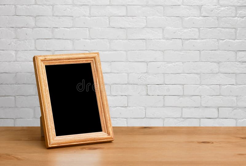 Photo frame on the table stock image. Image of effect - 255292581